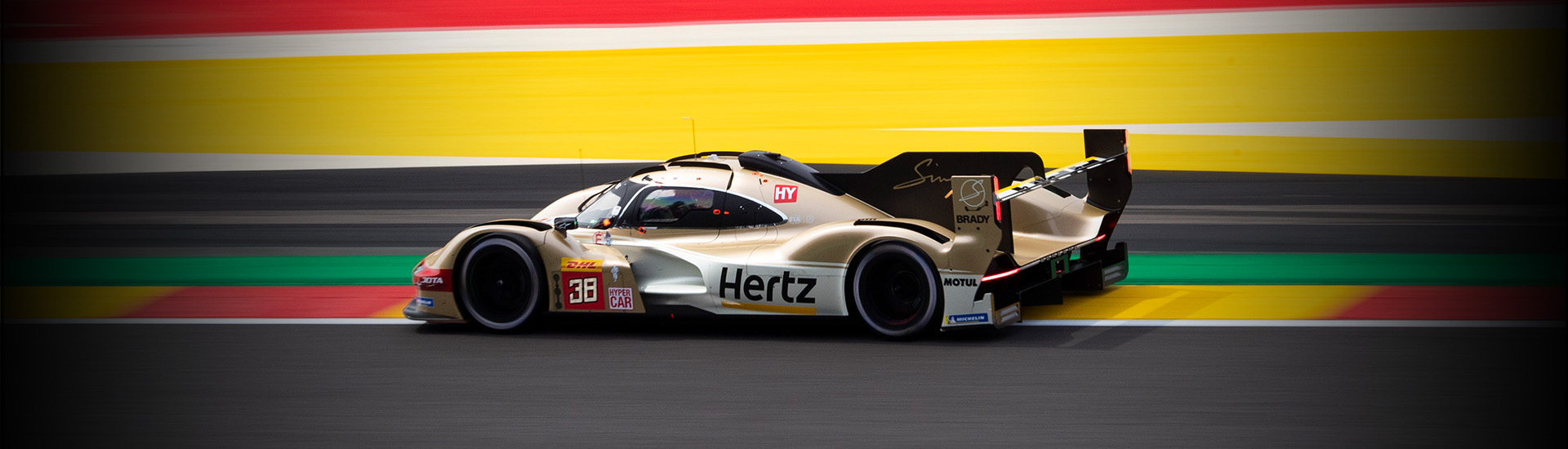 Hertz Racing Gold